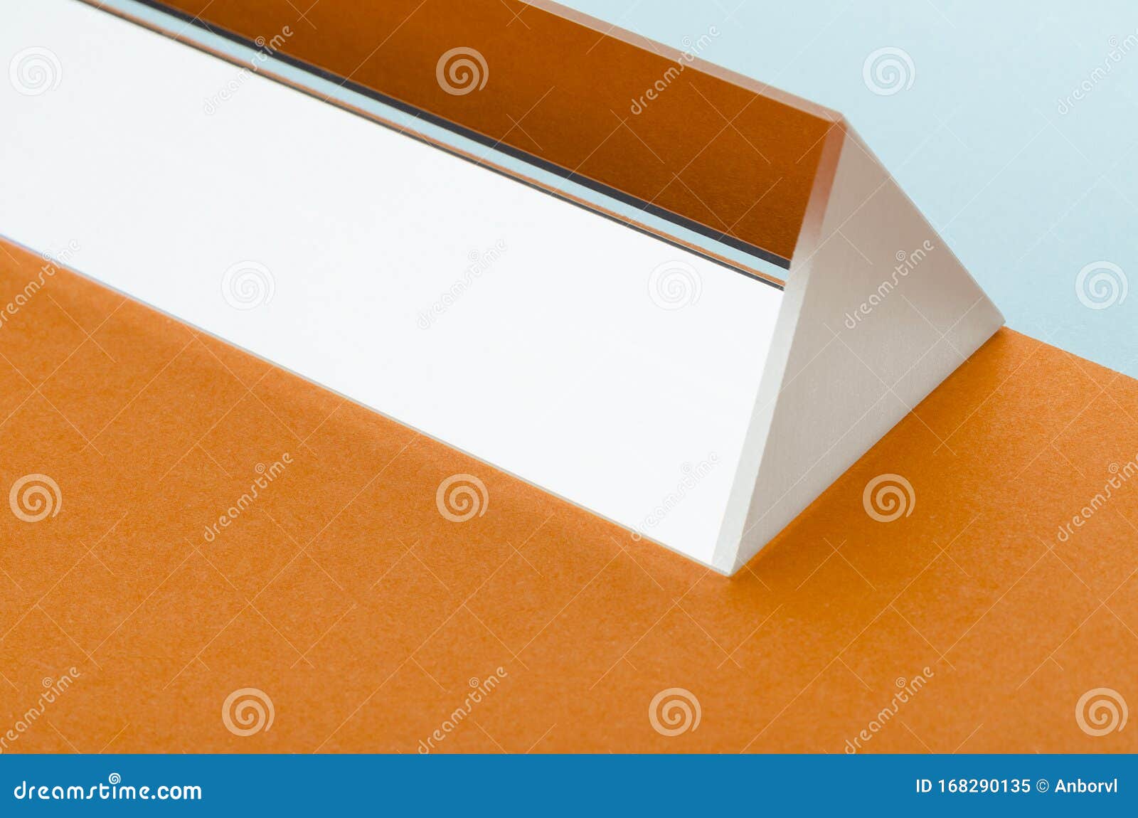 Bright Triangular Prism on Orange-blue Background Stock Image - Image ...