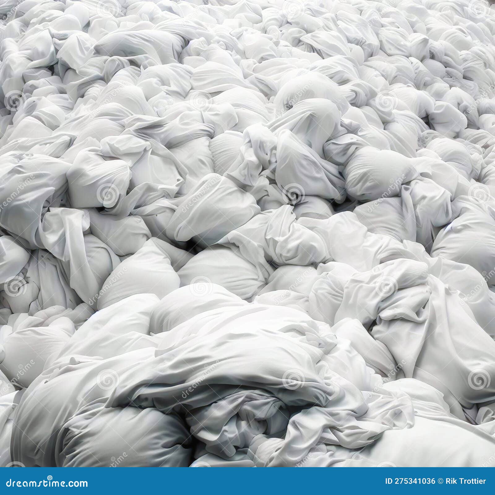 A Pile Of Unfolded Laundry On A Bed. Generative AI Stock Photography ...