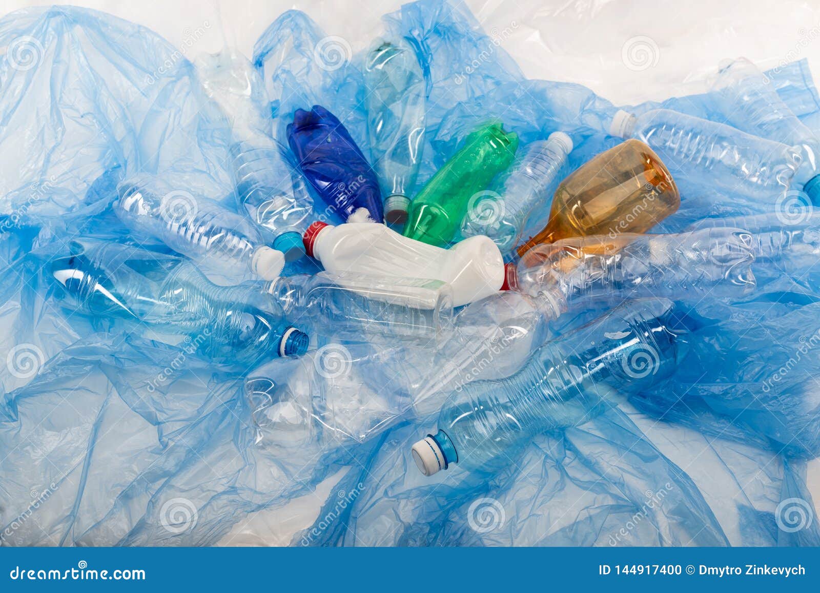 Bright Various Empty Bottles Being Deformed and Placed on Plastic ...