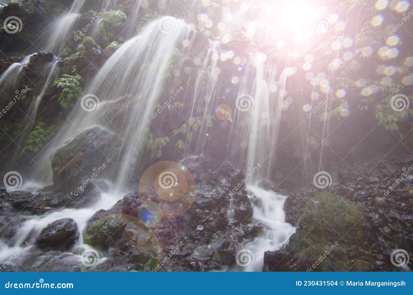 Bright Waterfall in the Forest with Sun Light Flare Background Stock ...