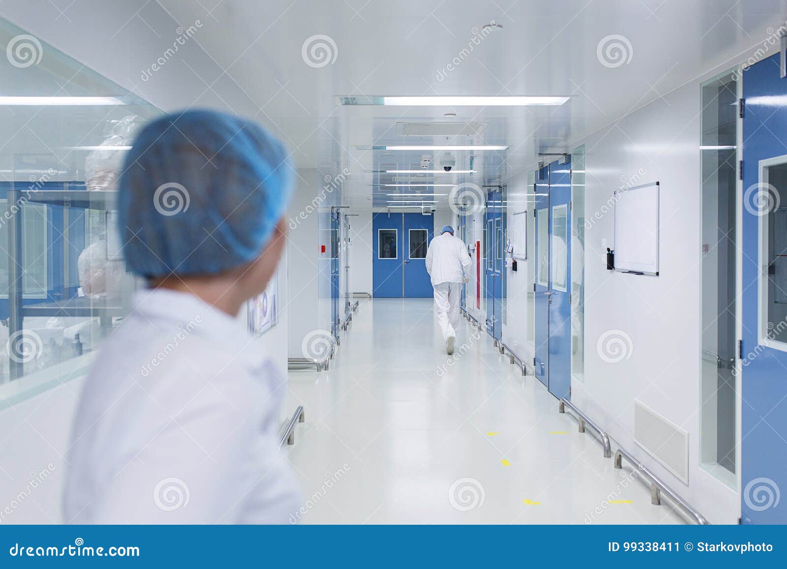 Bright, White with Blue Doors, a Sterile Corridor in a Medical Facility ...