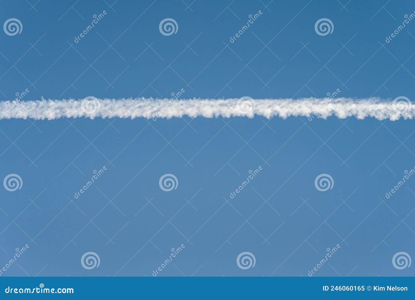 Bright White Contrail Cloud Against a Clear Blue Sky, As a Graphic ...