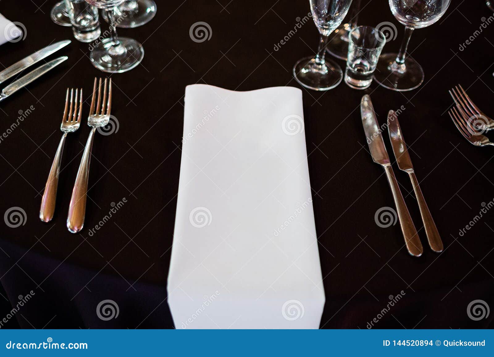 Bright White Dinner Napkin on a Dinner Table Stock Photo - Image of ...
