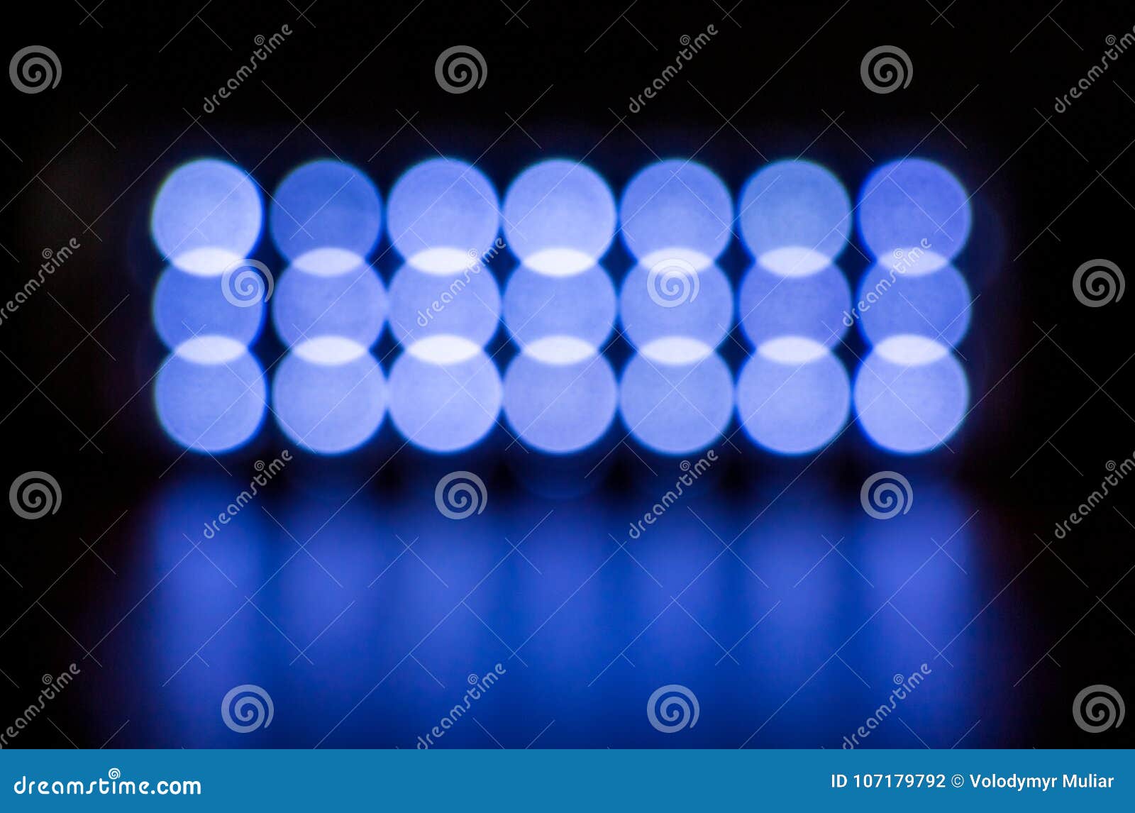 Bright White Fuzzy Lights Glow and Shine on a Dark Background_ Stock ...