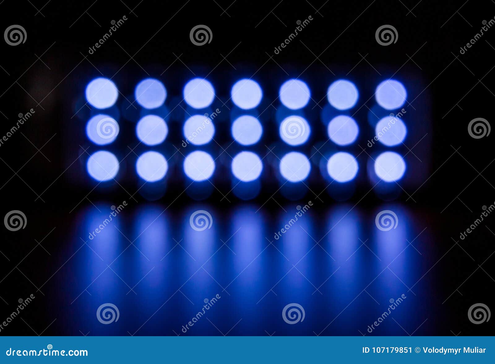 Bright White Fuzzy Lights Glow and Shine on a Dark Background_ Stock ...