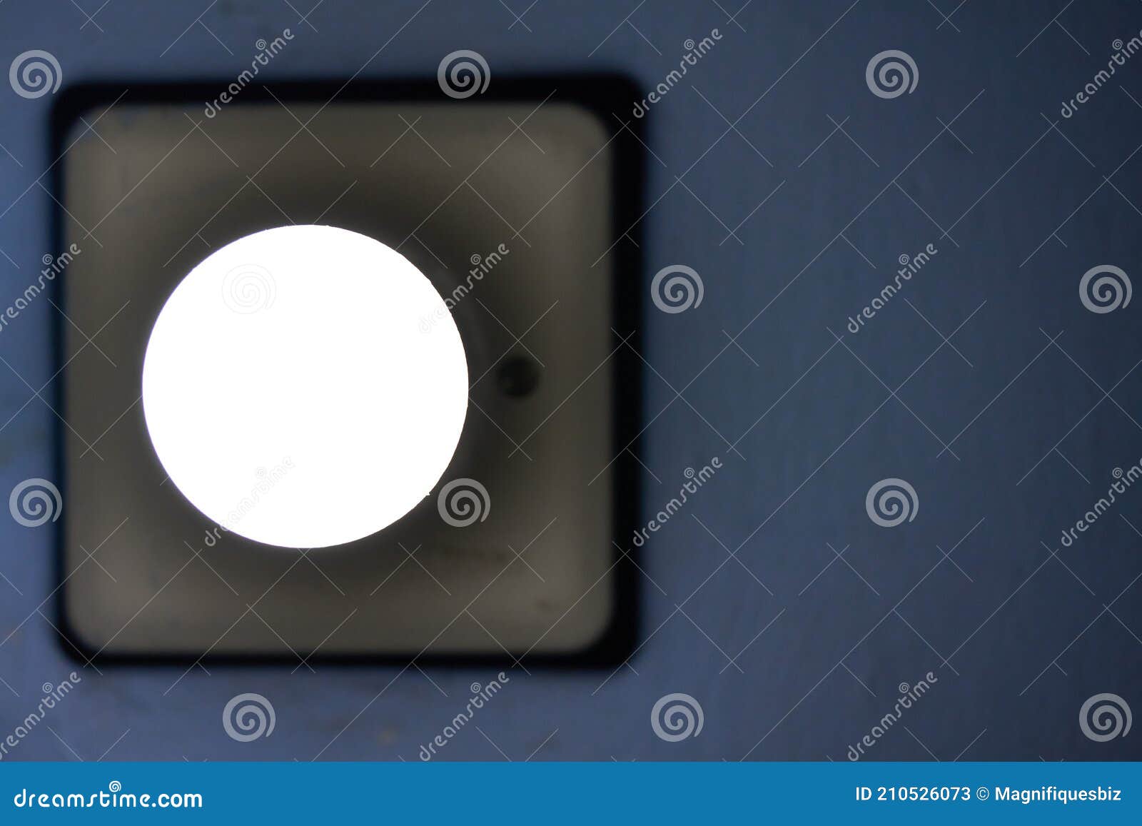 White Round Light Stuck To the Blue Wall Stock Image - Image of fork ...