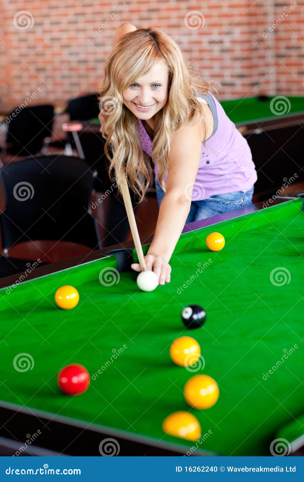 Bright woman playing pool stock photo. Image of night - 16262240