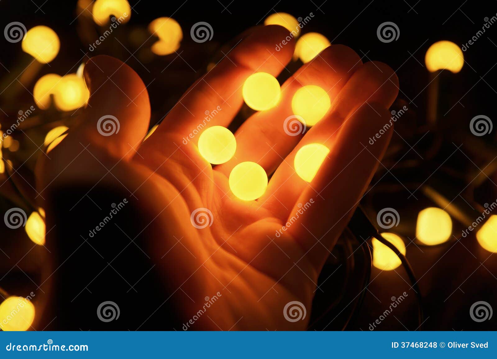Bright Yellow Balls in the Hands of a Man Stock Photo - Image of hand ...