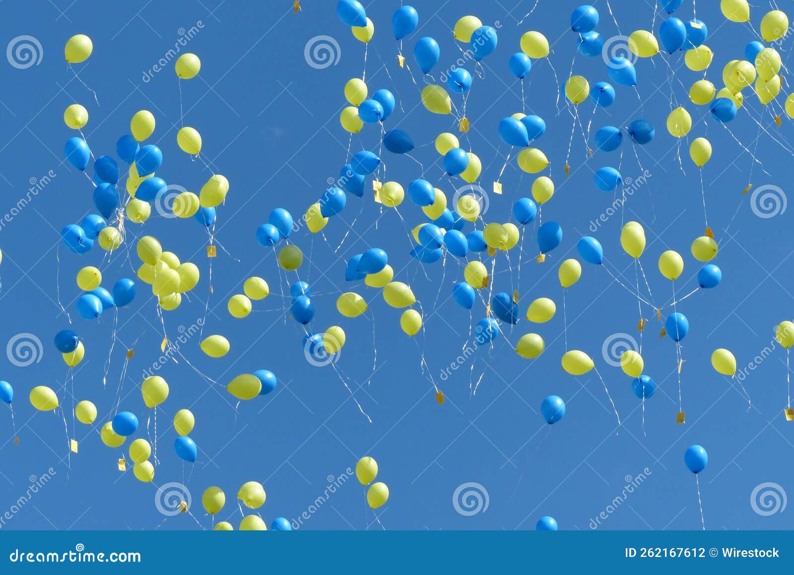 Yellow and Blue Balloons Flying in the Blue Sky Stock Photo - Image of ...