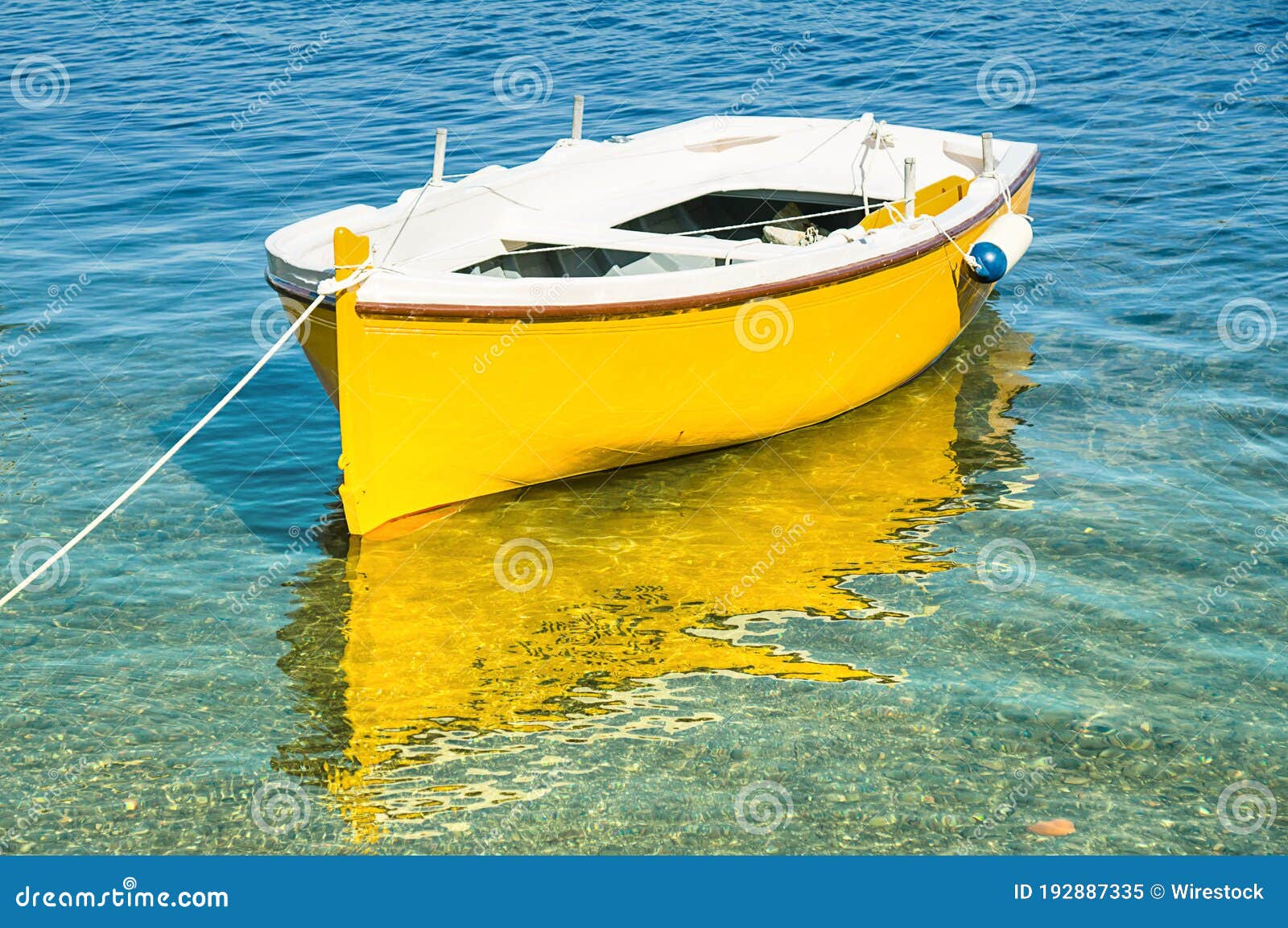Bright Yellow Boat Floating in Clear Waters on a Sunny Day Stock Image ...