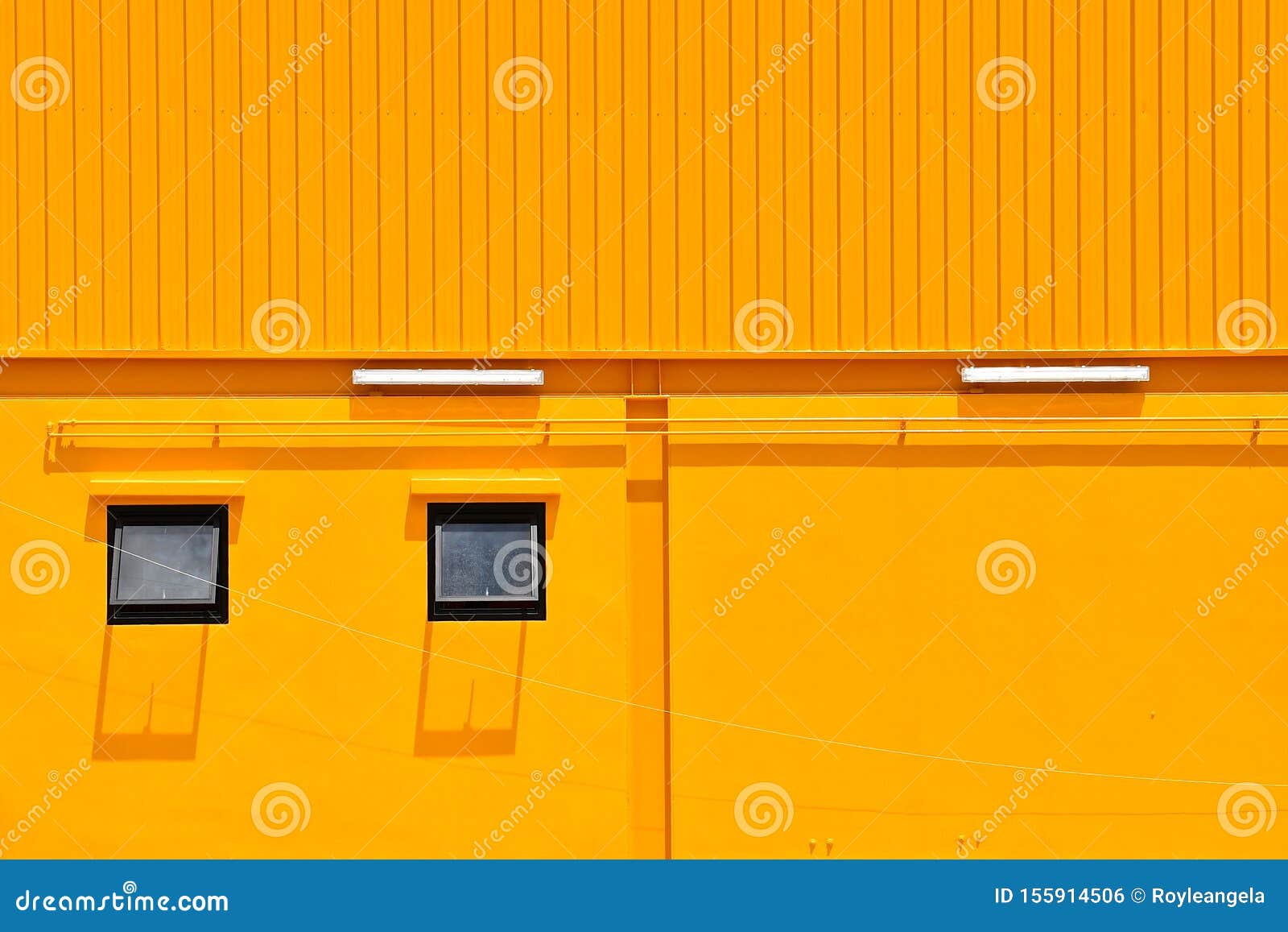 Bright yellow building stock photo. Image of golden - 155914506