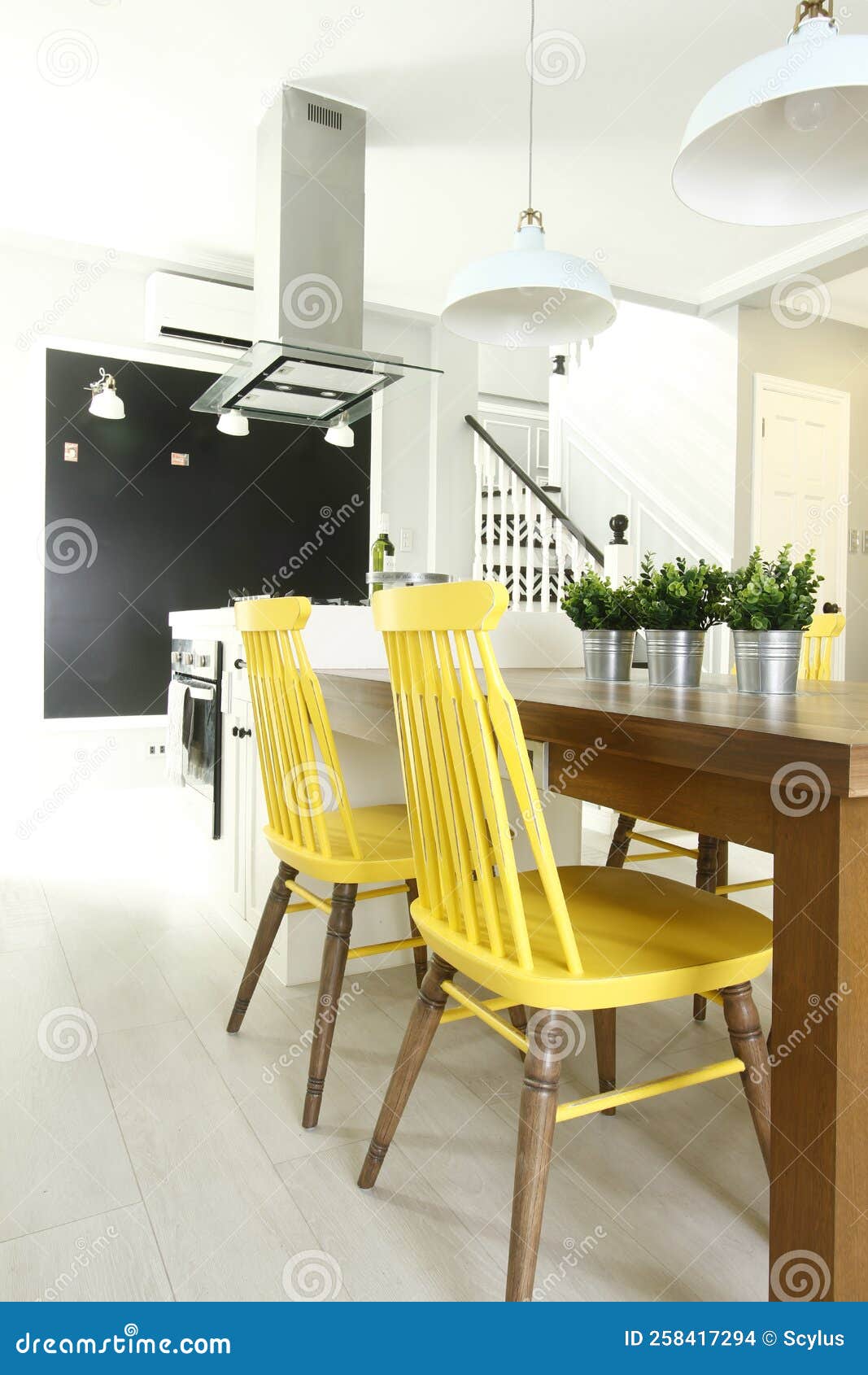 Bright Yellow Chairs and Solid Wood Table in a Stylish Dining Room and ...