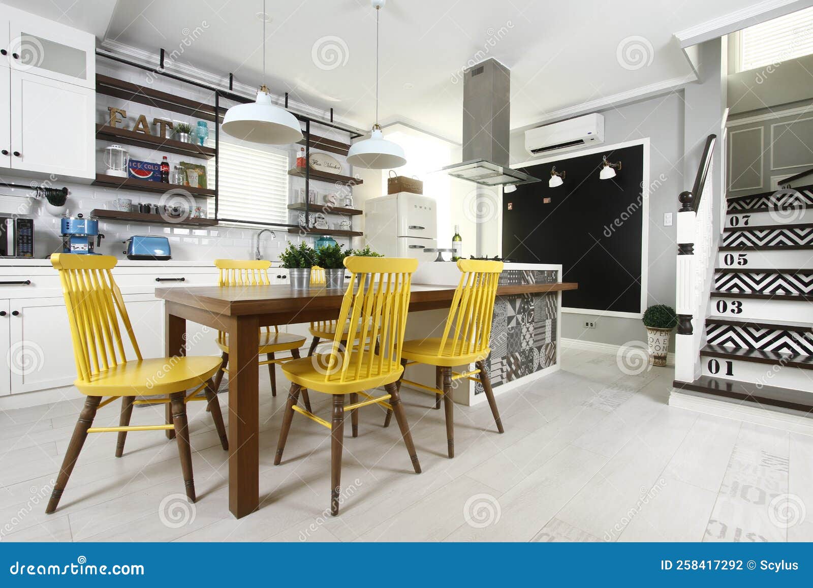 Bright Yellow Chairs and Solid Wood Table in a Stylish Dining Room and ...