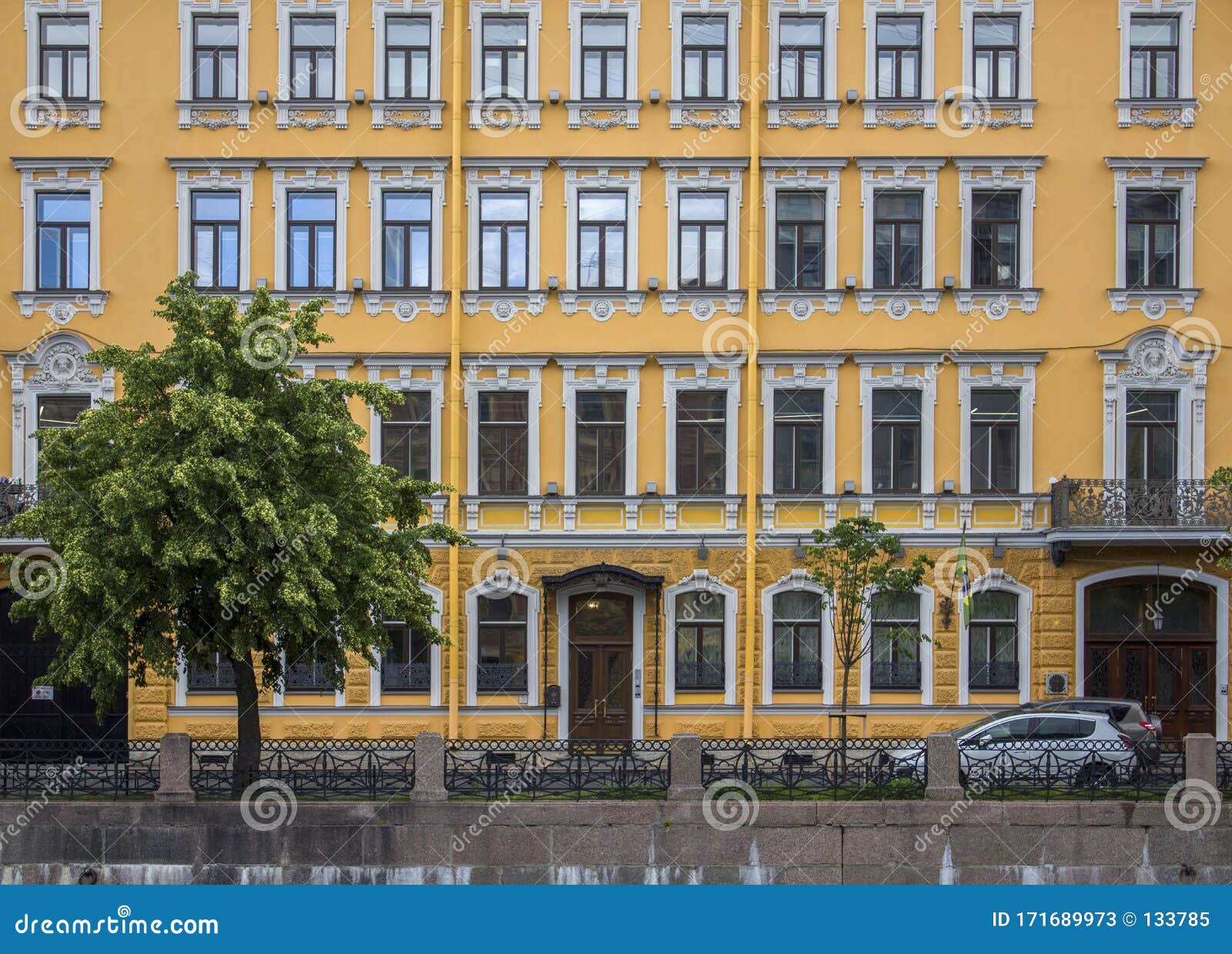 Bright Yellow Facade of the Historic Building Facade in the City ...