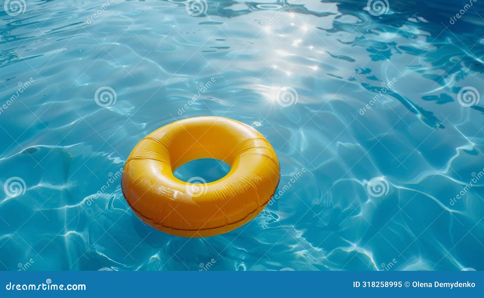 A Bright Yellow Life Ring Floats on the Shimmering Surface of a Pool ...