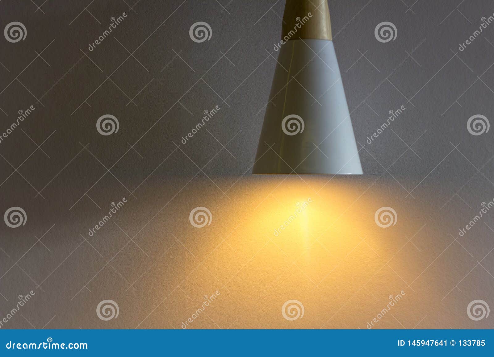 Bright Yellow Light of a Lamp on a Grainy White Gray Wall with Shadows ...