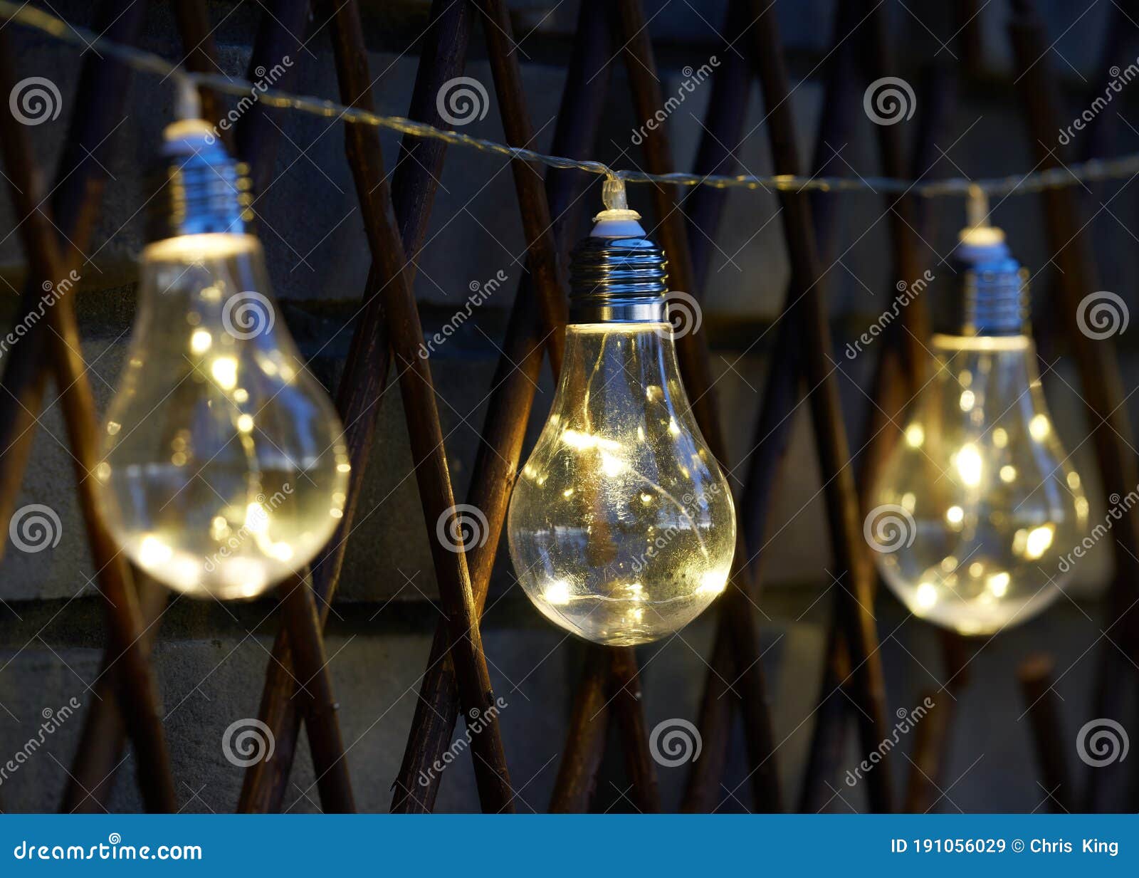 Bright Yellow Lights Hanging in the Night Garden Stock Image - Image of ...
