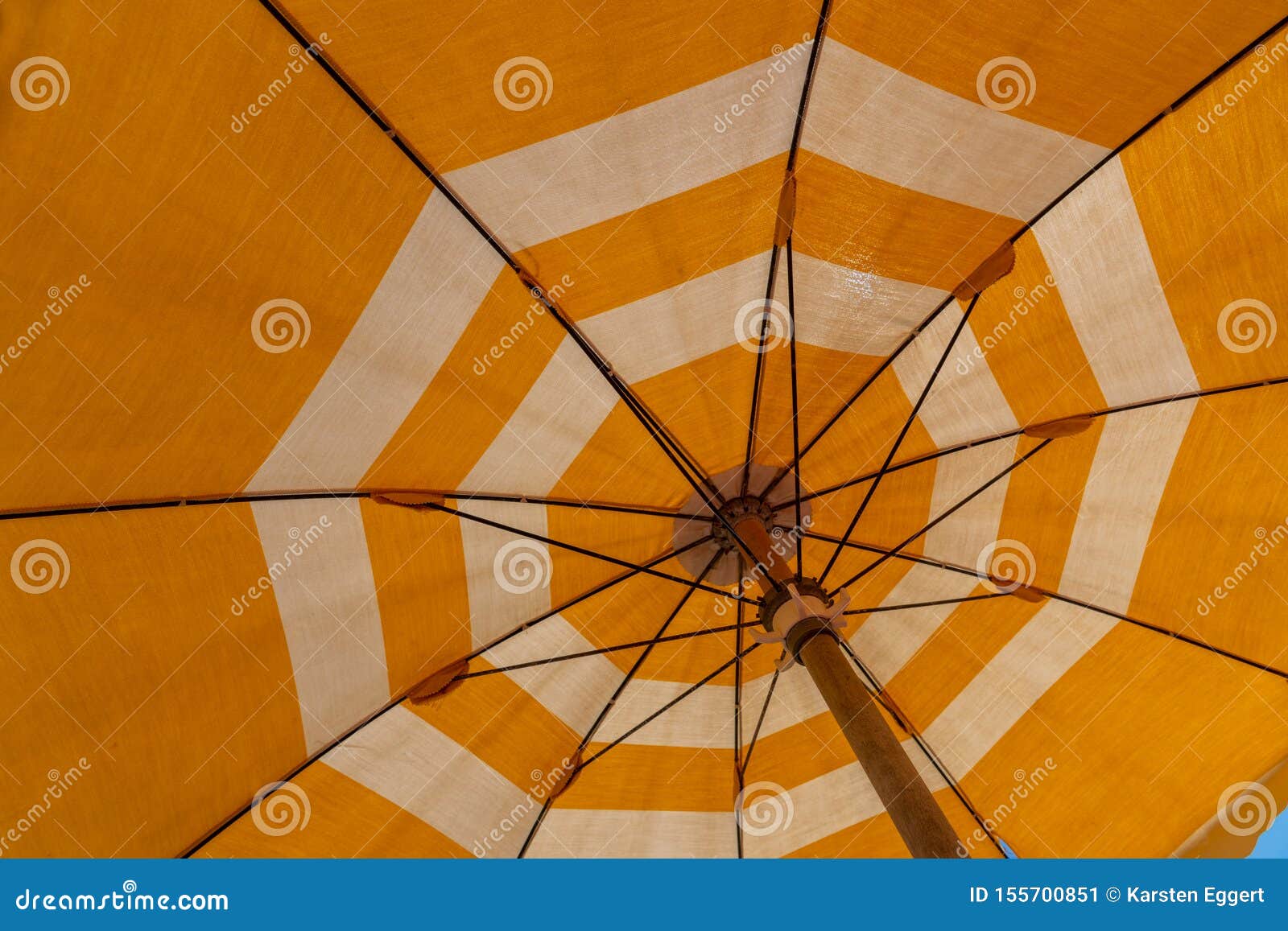 Bright Yellow Parasol Stretched Out on the Beach Stock Image - Image of ...