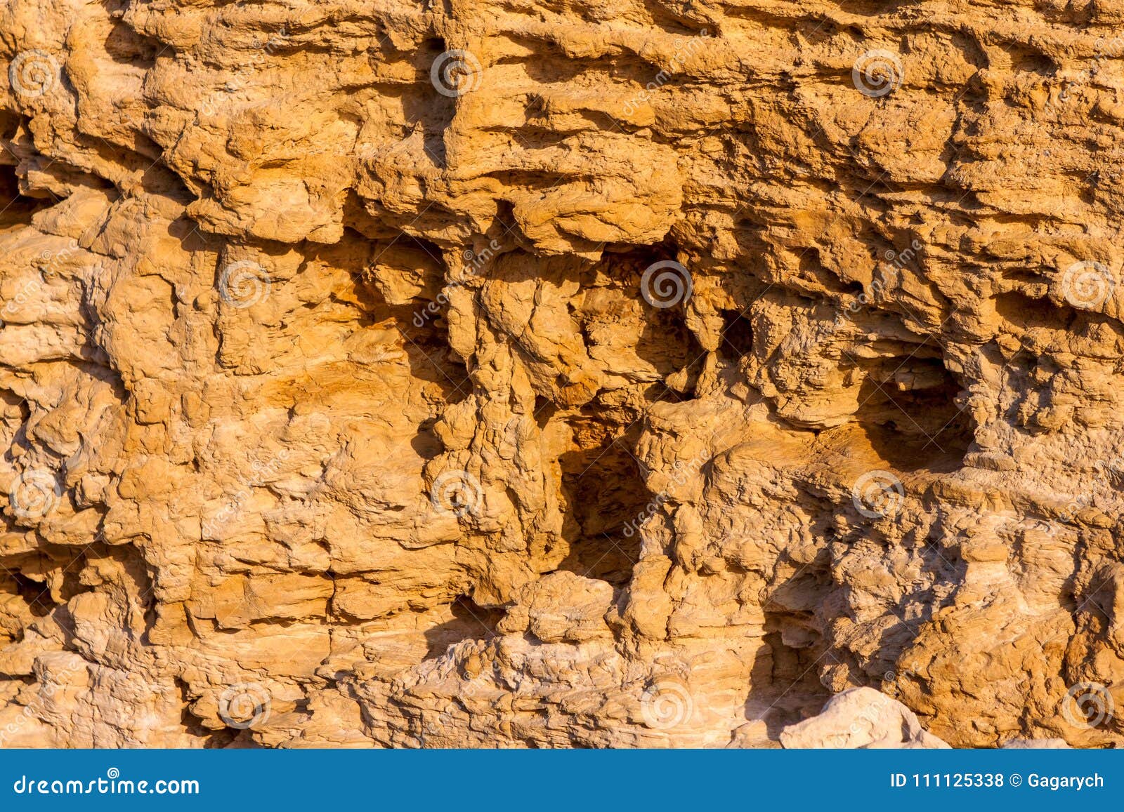 Bright Yellow Rock Surface Texture Under Sunlight. Stock Photo - Image ...