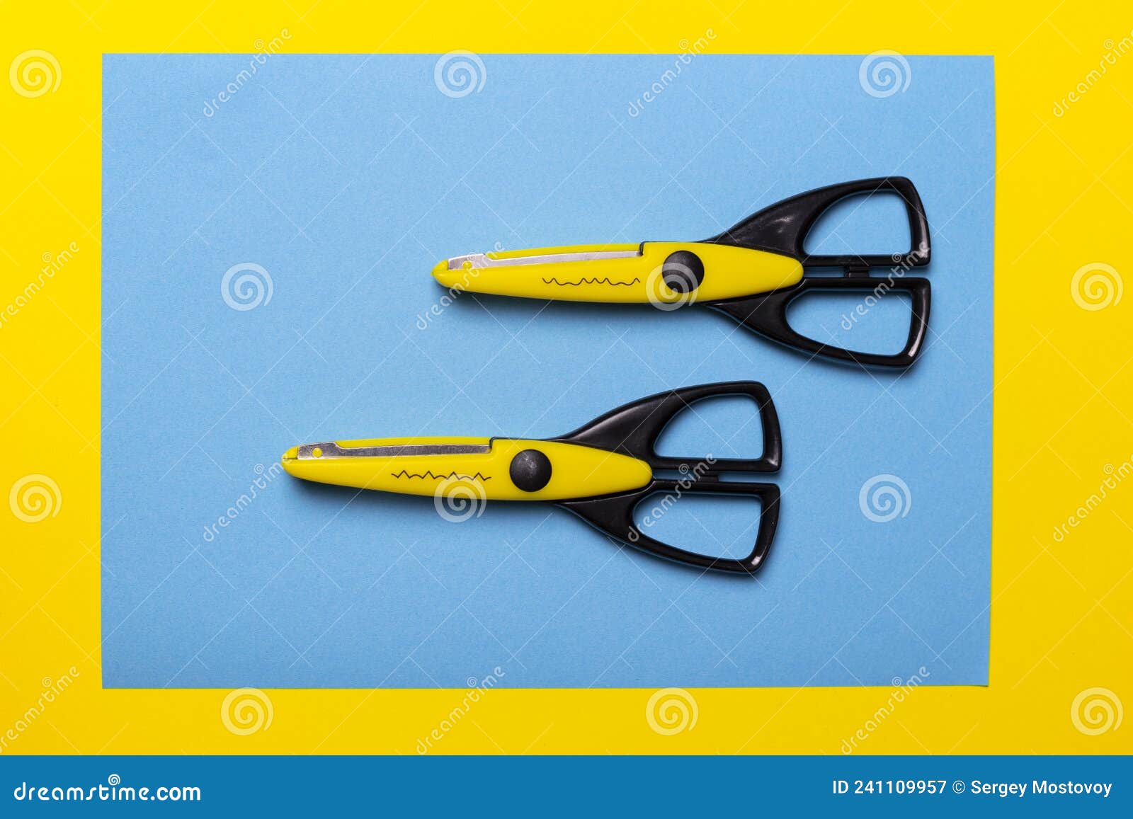 Bright Yellow Scissors on a Blue Background Stock Image - Image of ...