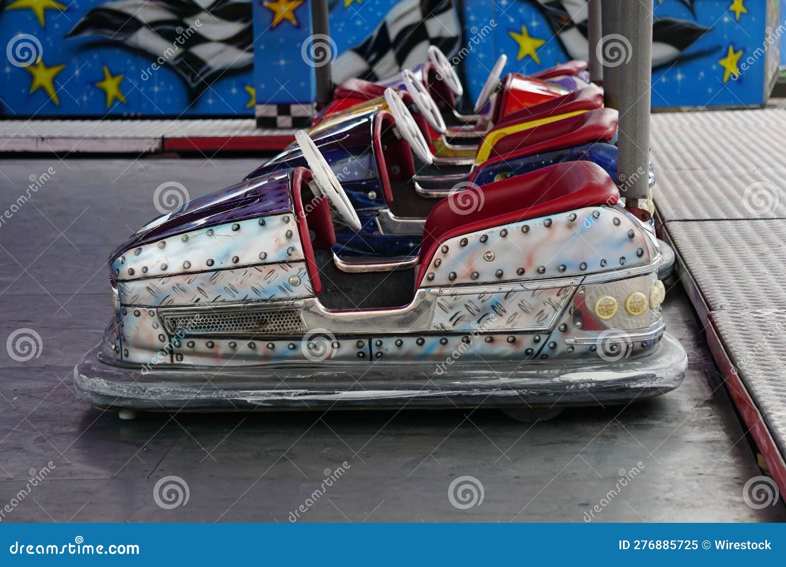 Cars On An Old Carnival Ride Using Centrifugal Force For Thrills ...