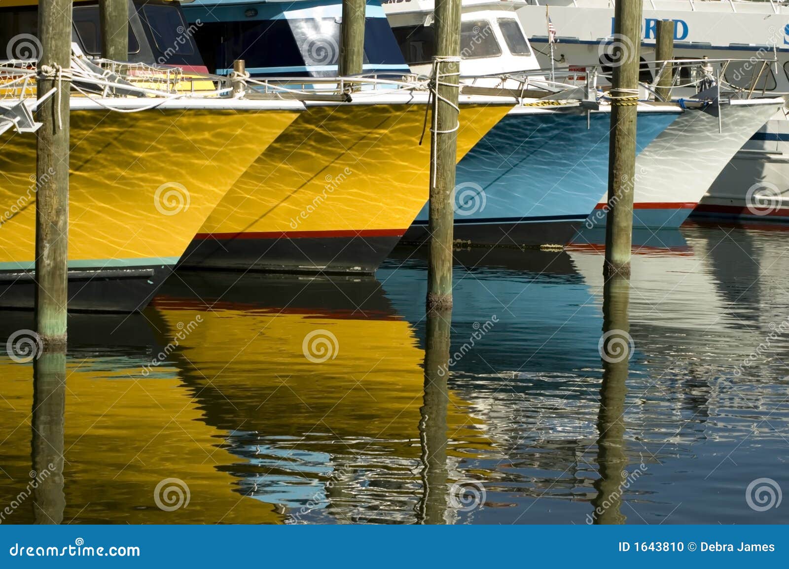 Brightly Colored Boats and Reflections Stock Photo - Image of blue ...
