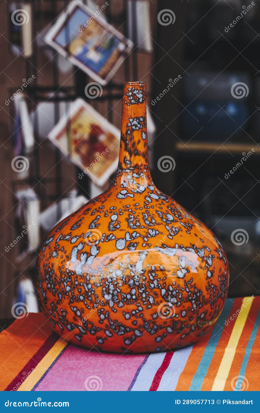 Brightly Colored Pottery Vase Placed on a Table - Home Design Stock ...