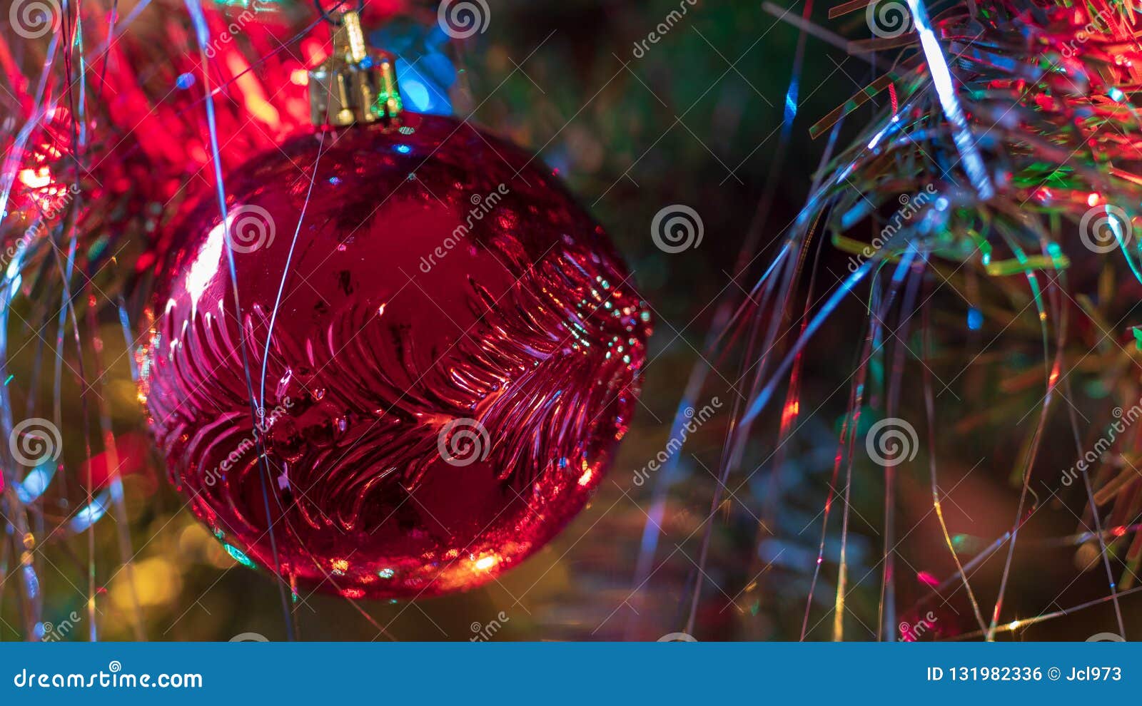 Brightly Colored, Cheery Christmas Tree Ornaments Hung Up with Lights ...
