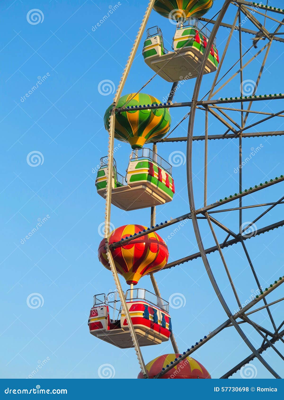 Brightly Colored Ferris Wheel Against the Blue Sky Stock Photo - Image ...