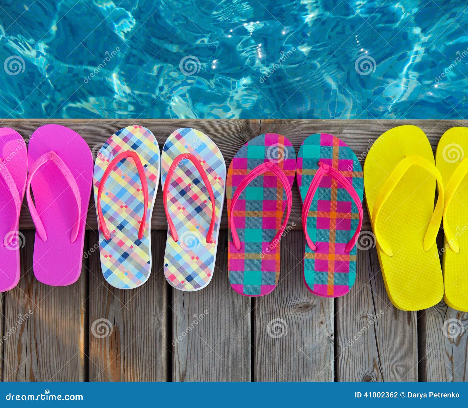Brightly Colored Flip-flops On Wooden Background Stock Photo - Image of ...