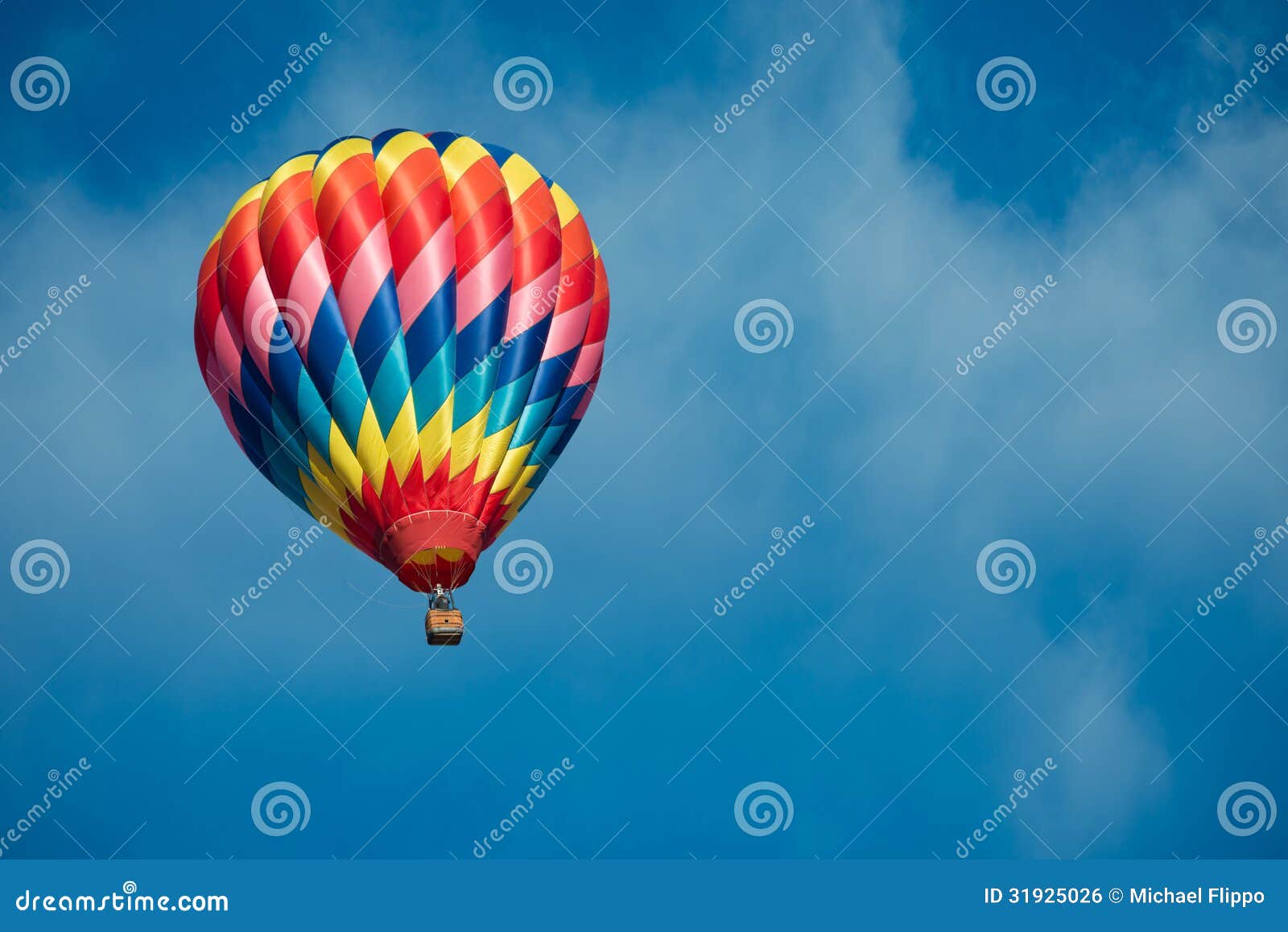 Brightly Colored Hot Air Balloon with a Sky Blue Background Stock Photo ...