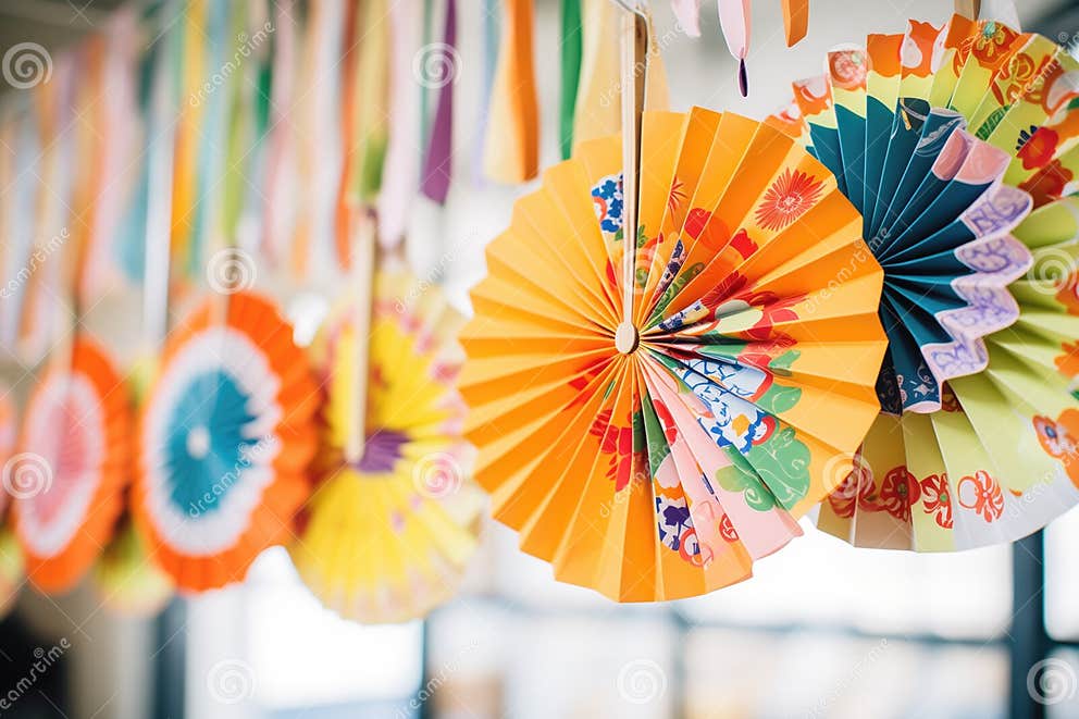 Brightly Colored Paper Fans Displayed on String Stock Image - Image of ...