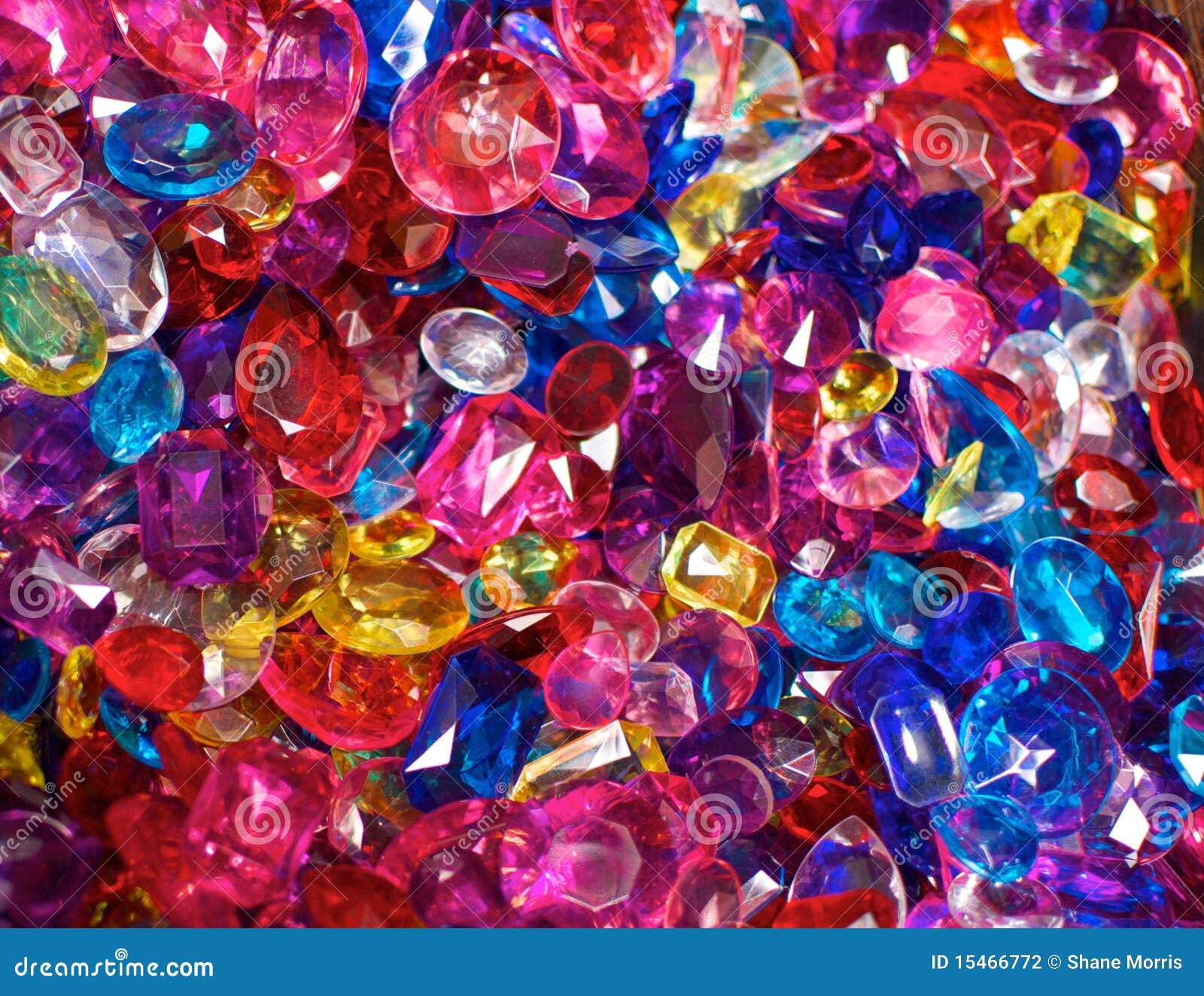 Brightly Colored Plastic Jewels Stock Photo - Image of horizontal ...