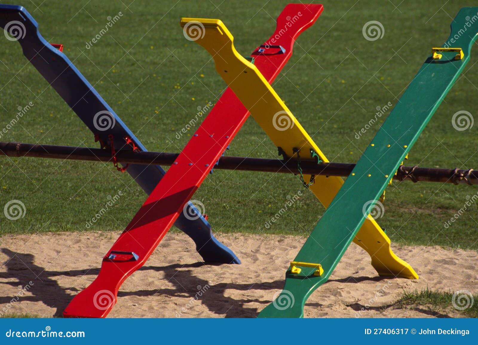 Brightly colored see-saws. stock image. Image of bright - 27406317