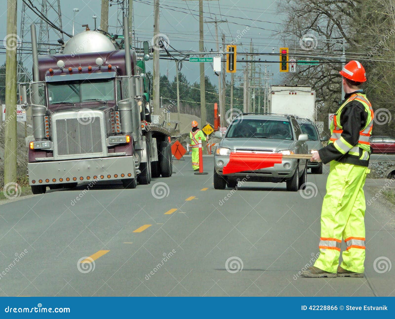Brightly Colored Workers Control Traffic Editorial Photo - Image of ...