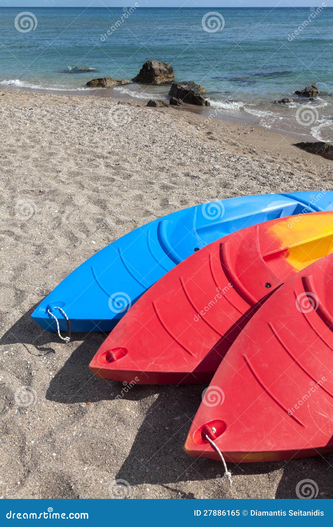 Brightly coloured canoes stock image. Image of clean - 27886165