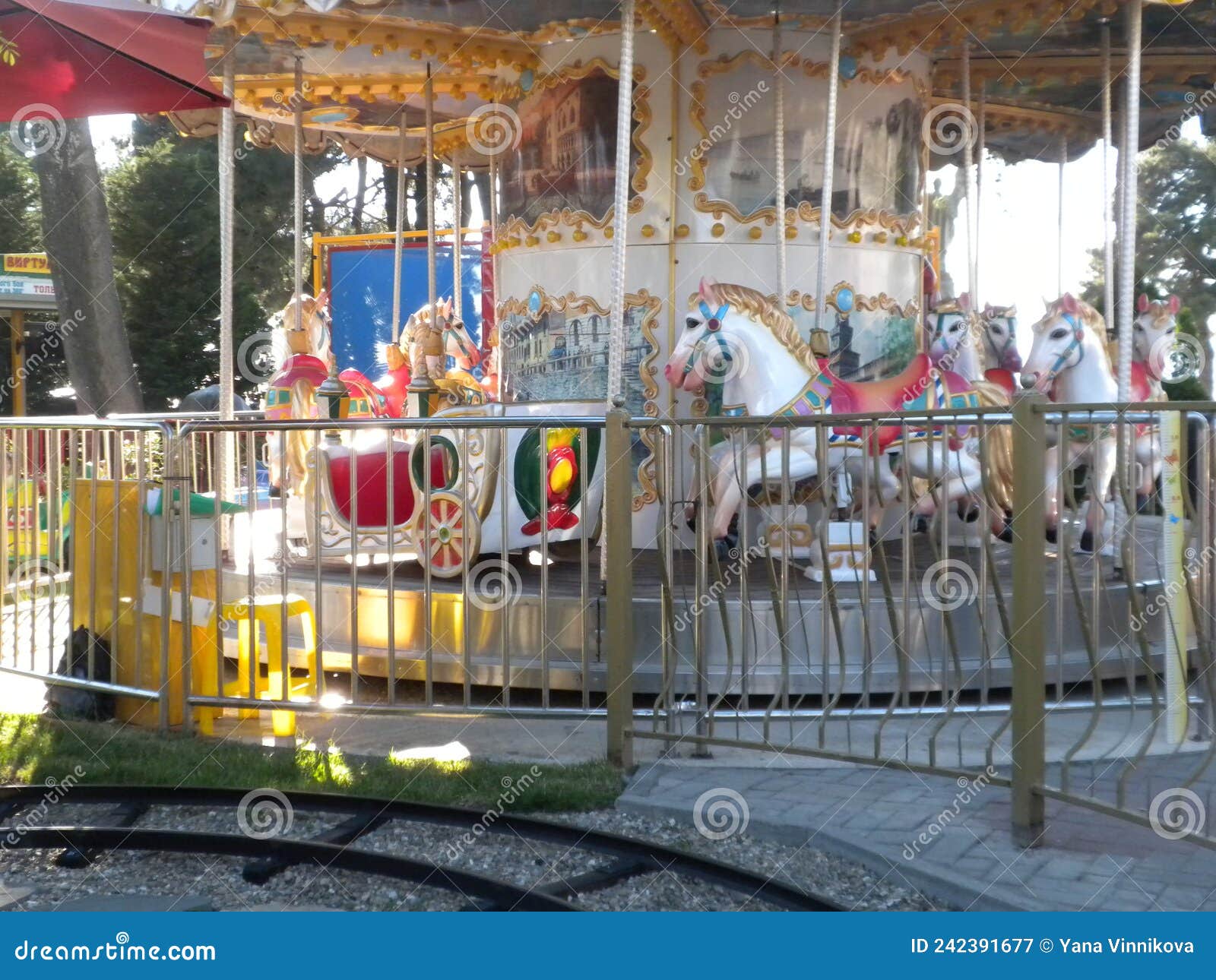 Brightly Coloured Carousel with Galloping Ponies Stock Image - Image of ...