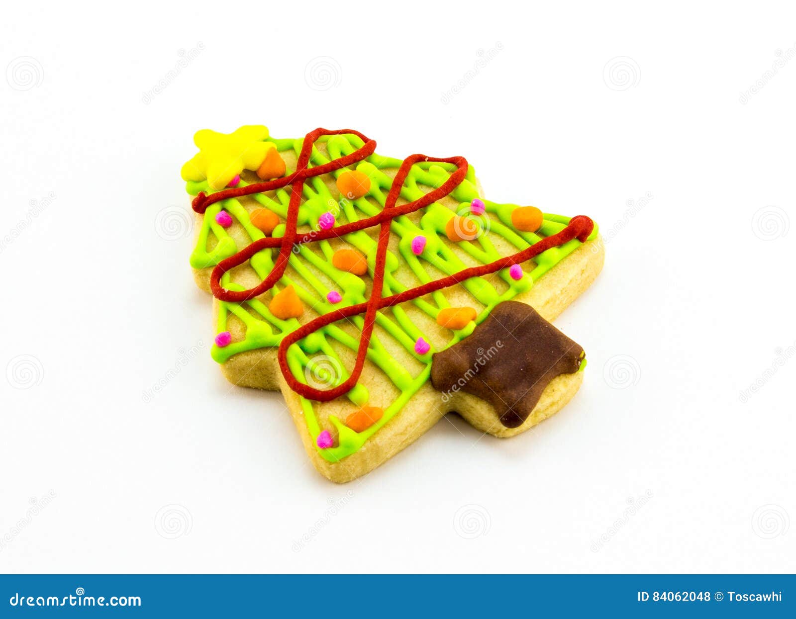 Brightly Iced Christmas Tree Biscuit on White Background Stock Photo ...