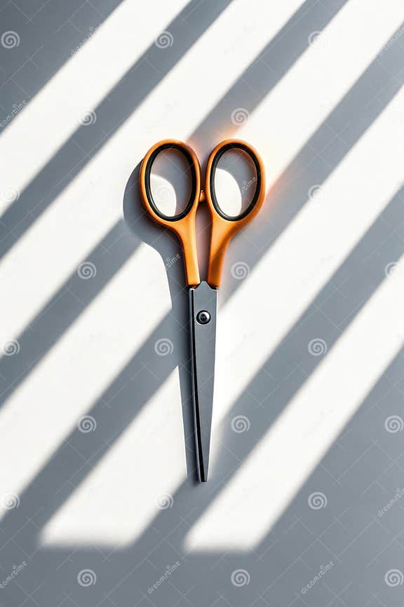 Brightly Lit Scissors Placed on a Surface with Shadows Creating a ...