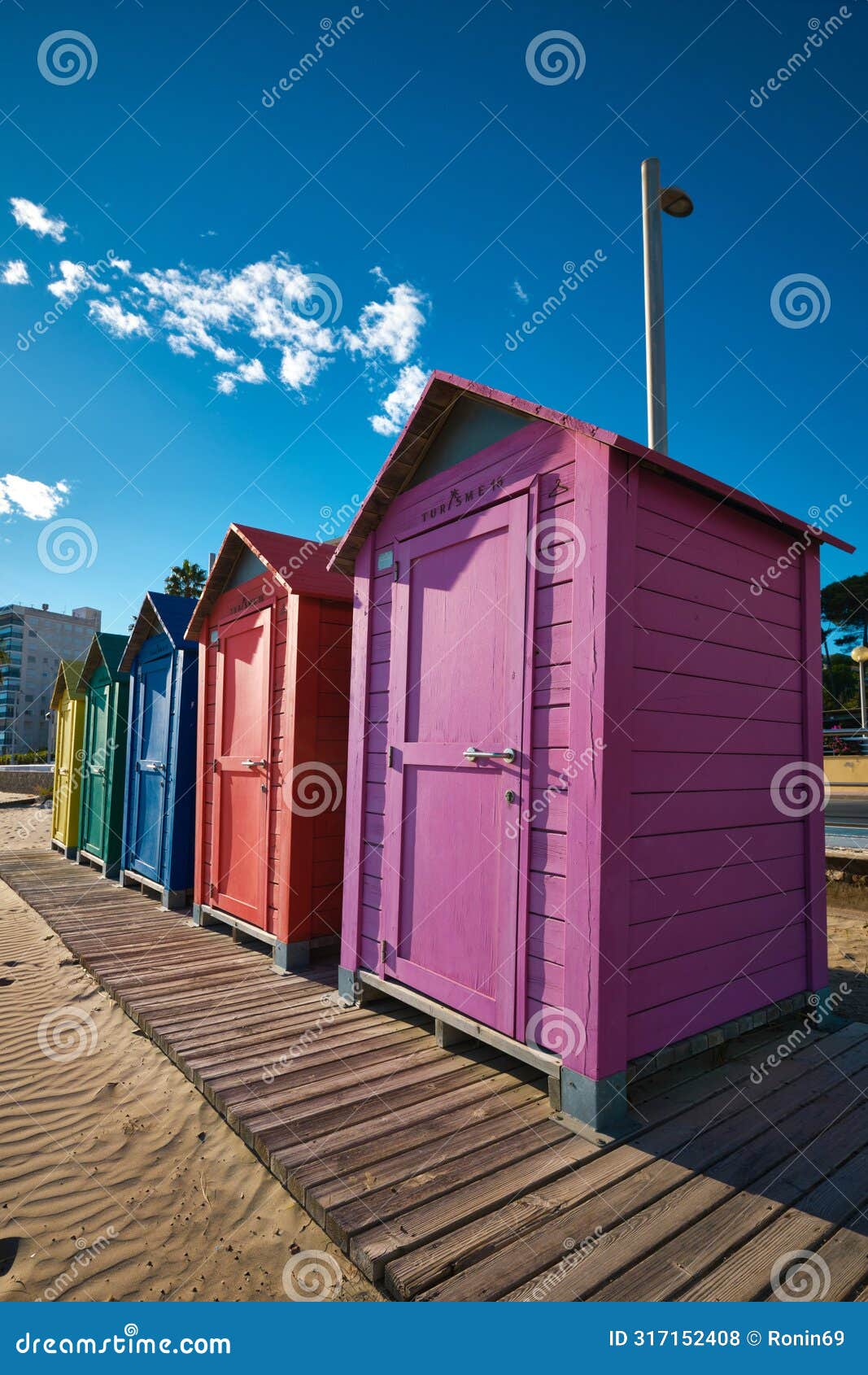 Brightly Painted Summer Beach Change Rooms Stock Photo - Image of sand ...