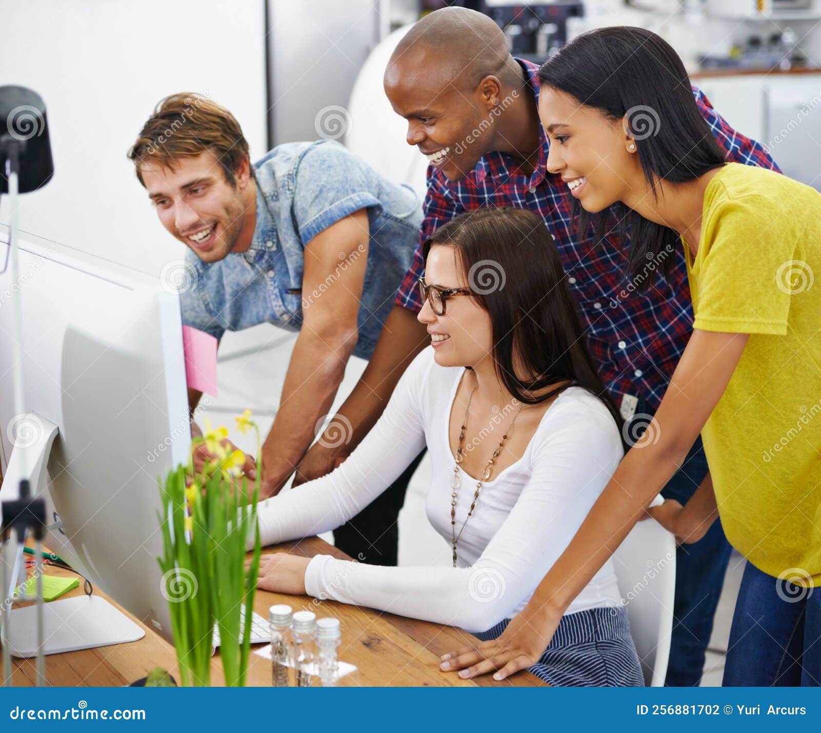 Bringing Ideas into Focus. a Young Designers at Work in an Office ...