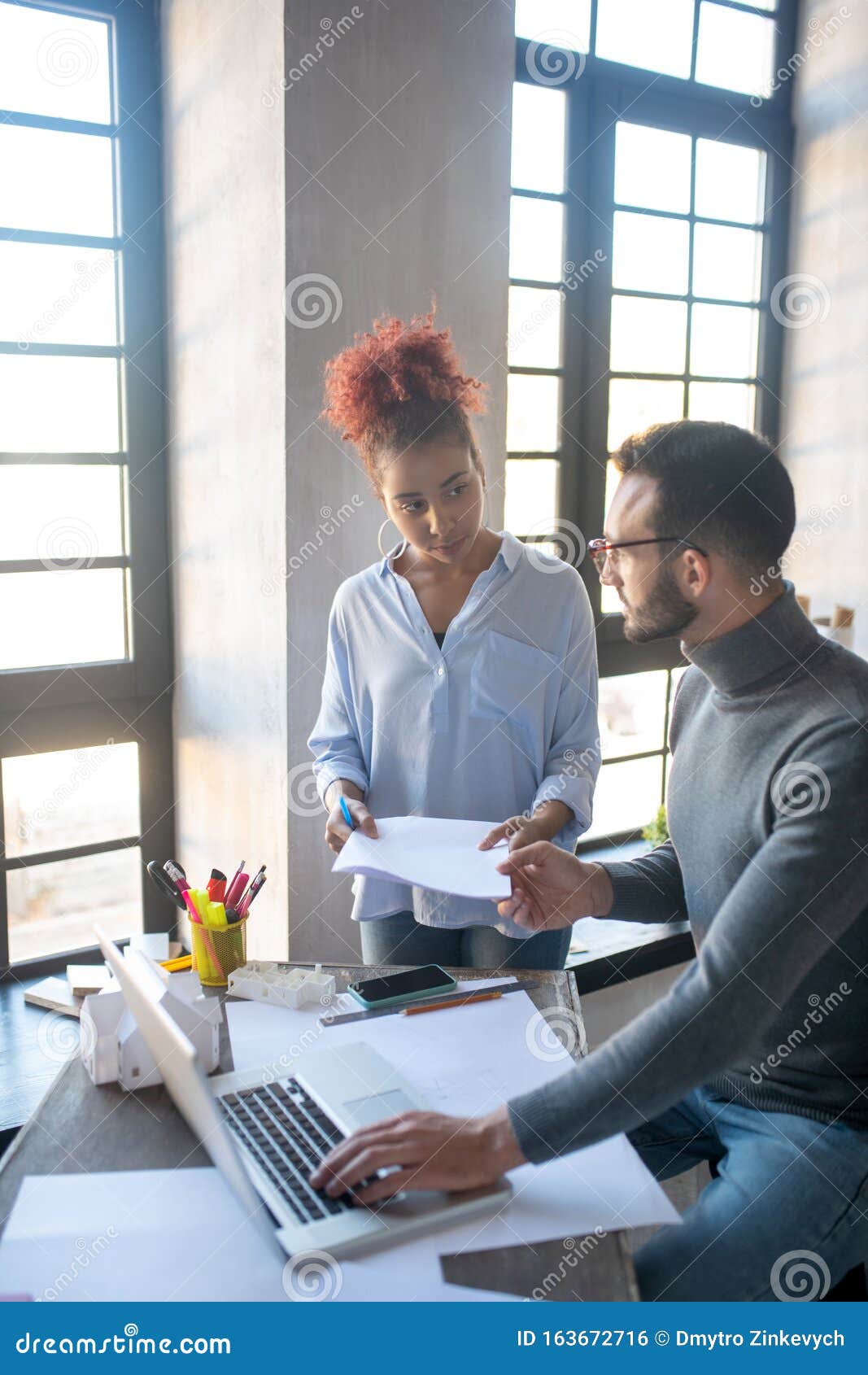 Curly Secretary Bringing Some Documents for Interior Designer Stock ...