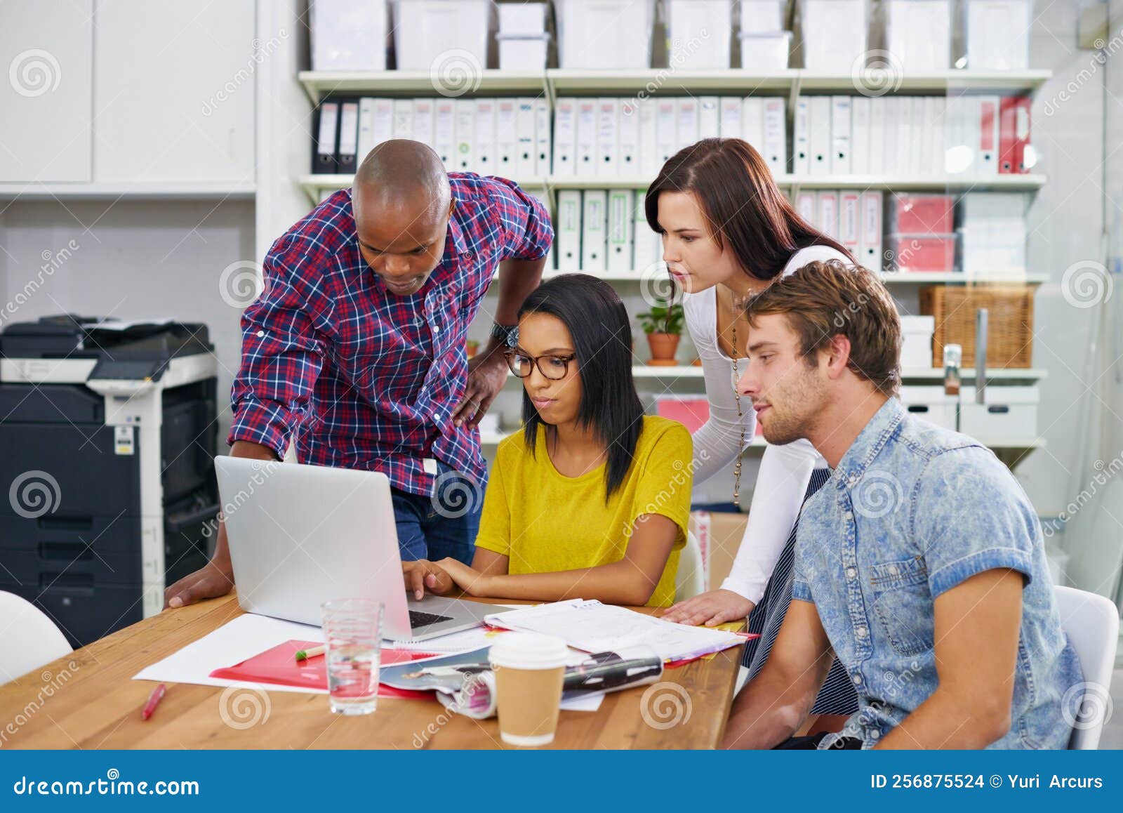 Bringing Their Ideas into Focus. a Young Designers at Work in an Office ...