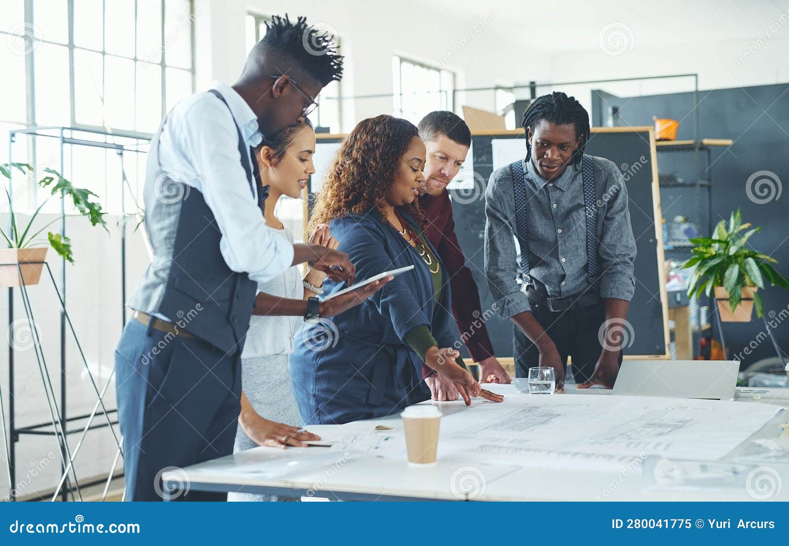 Bringing Their Ideas Together. a Team of Professionals Working on ...