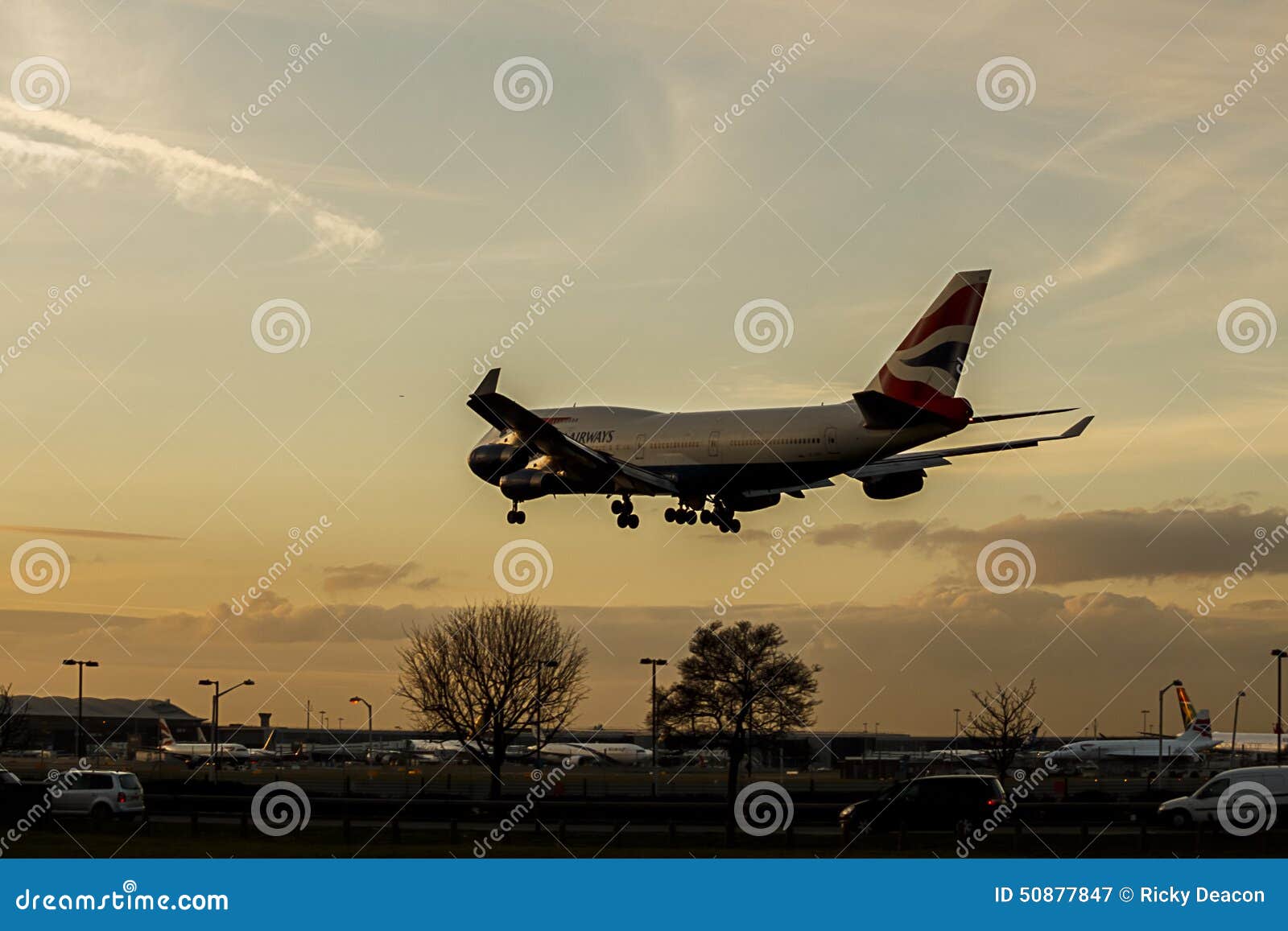 British Airways Passenger Aircraft Landing Approach at Sunset. Boeing ...