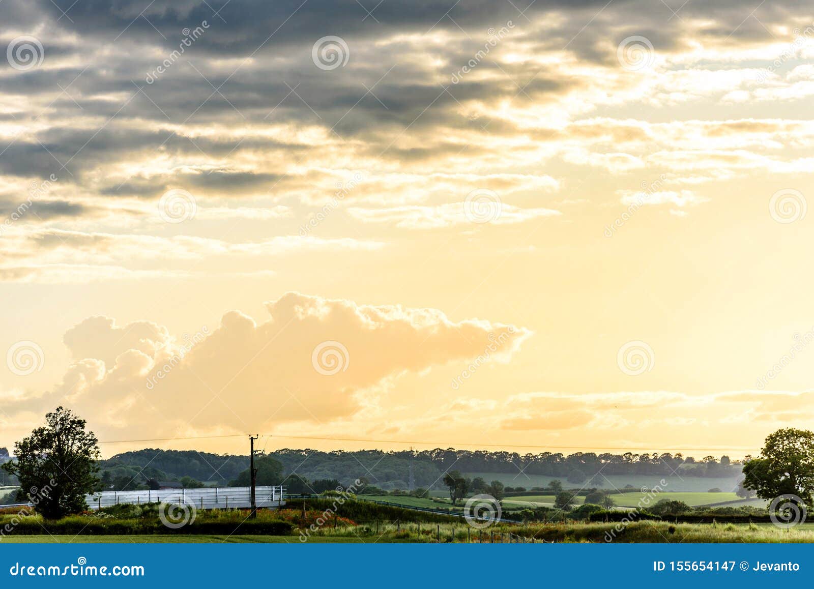 British Countryside Landscape at Sunset in Summer Stock Image - Image ...