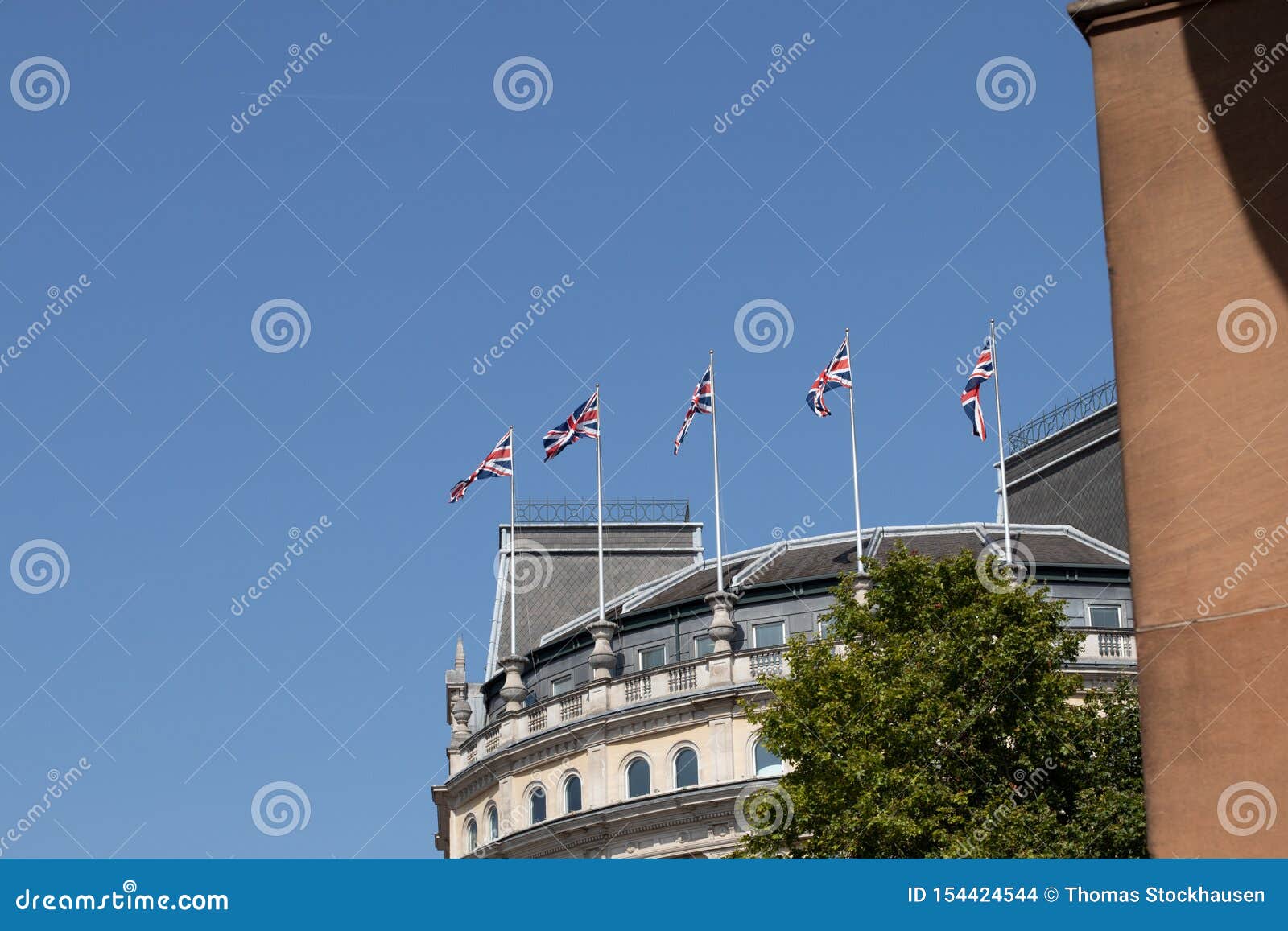 British Flags on a Building in London Stock Photo - Image of pole, blue ...
