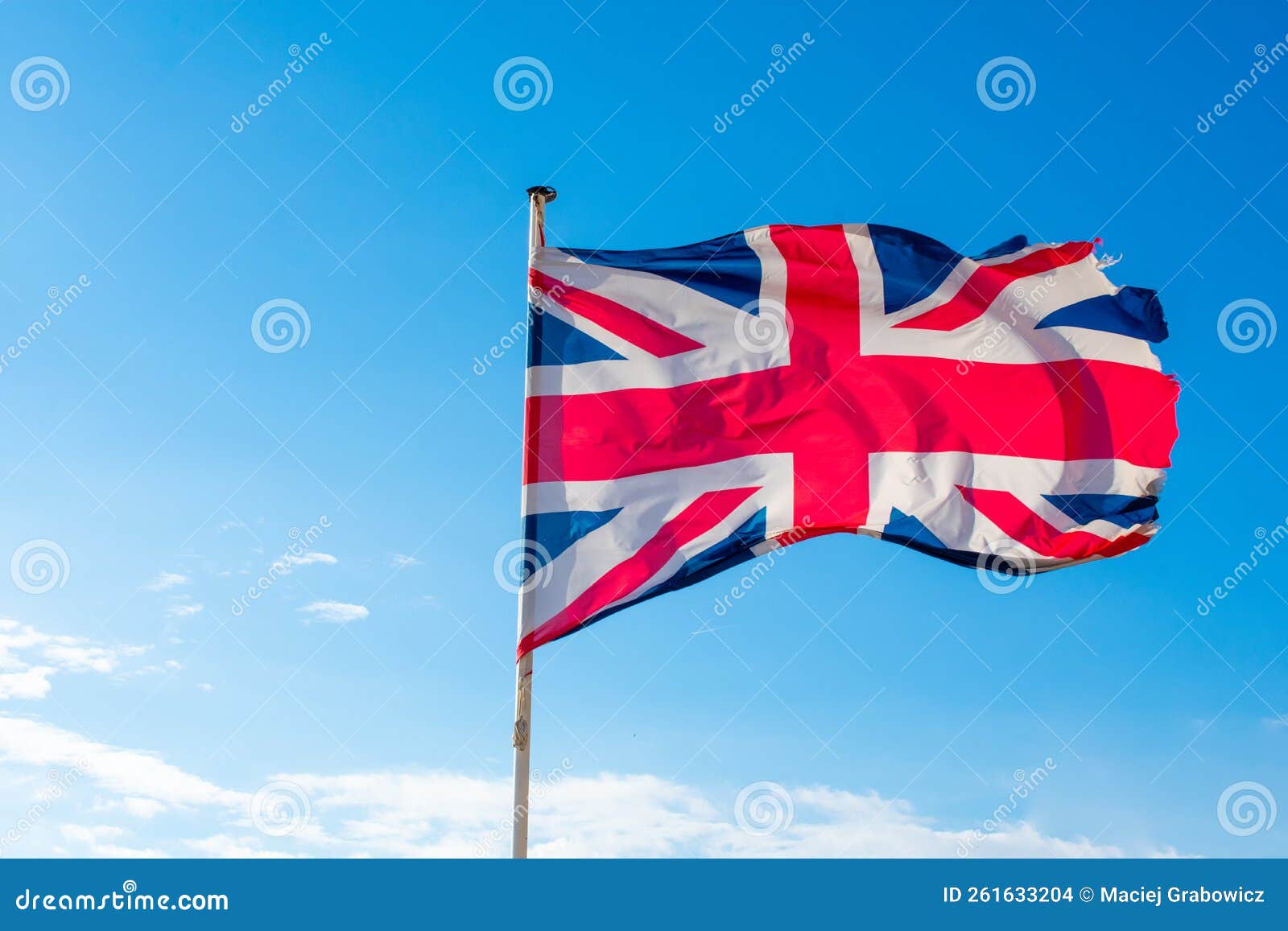 British Flag Waving Against Blue Sky Stock Photo - Image of destination ...