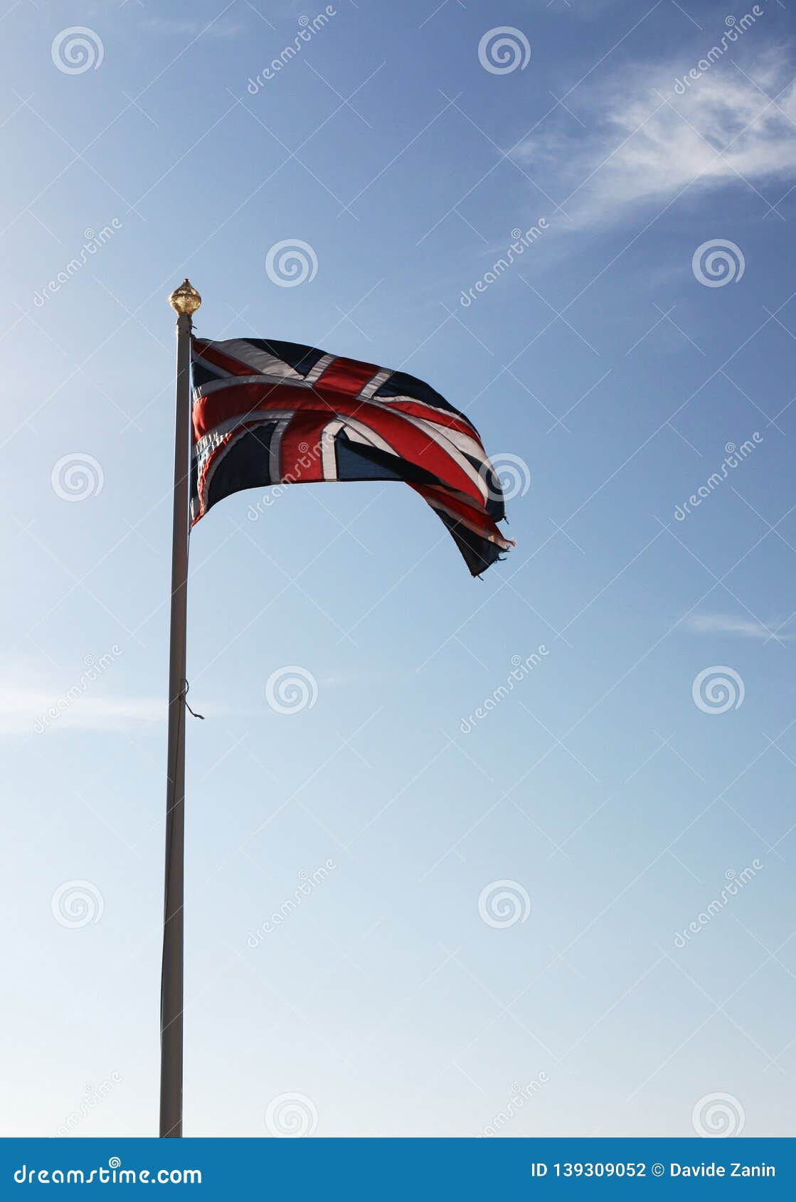 British Flag Waving in the Wind Stock Photo - Image of flagstaff ...