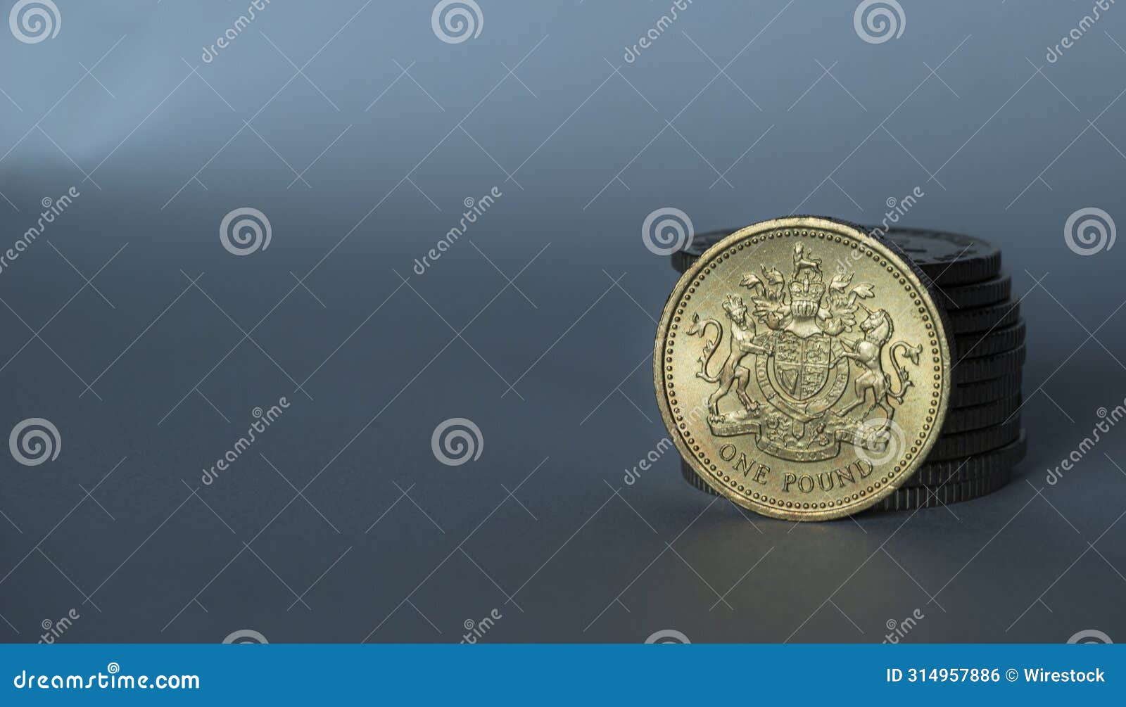 British One-pound Coin on a Gray Backdrop Stock Photo - Image of ...